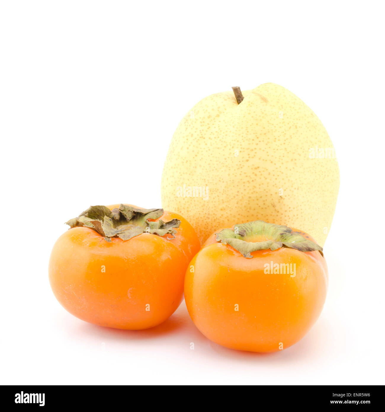 chinese pear and two persimon isolated on white background Stock Photo ...