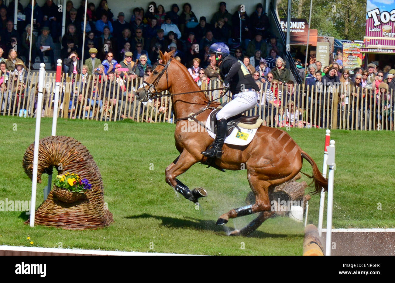 Oliver Townend at the water jump as part of the cross country event at ...