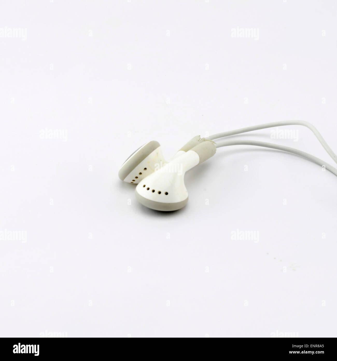 white earphone isolated on white background Stock Photo - Alamy