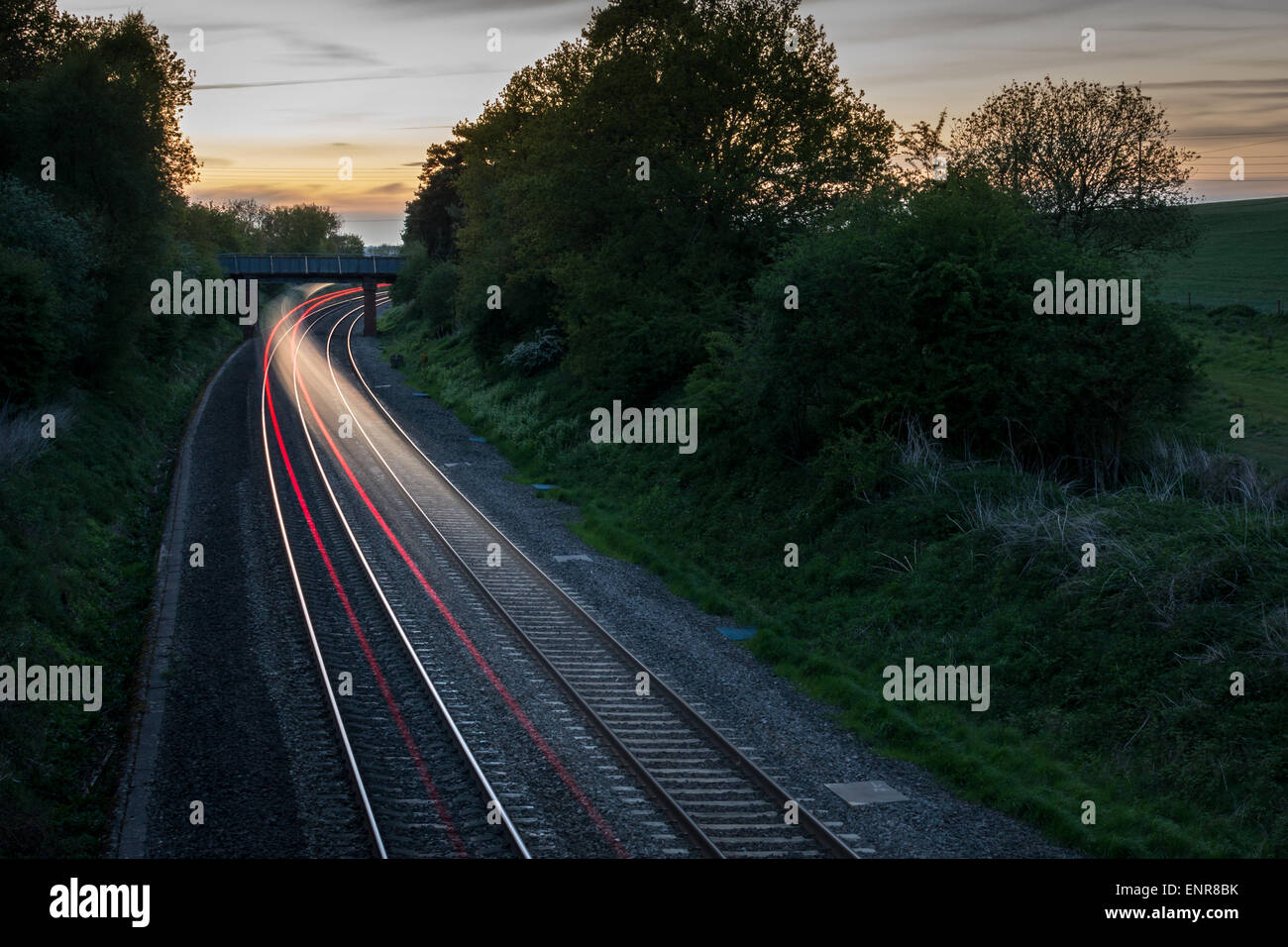 Train in the sunset Stock Photo - Alamy