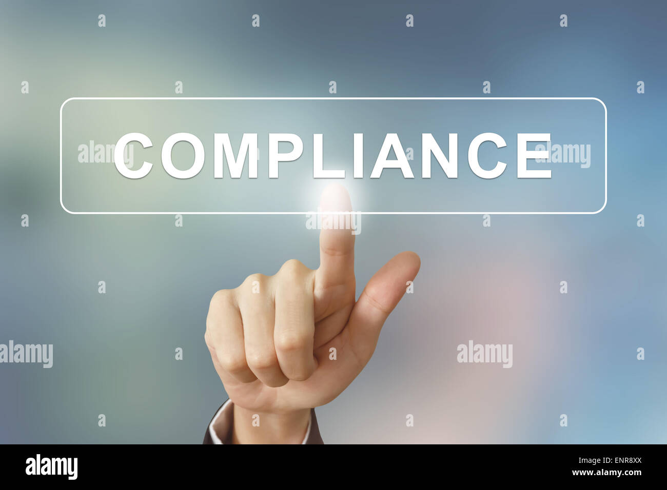 business hand pushing compliance button on blurred background Stock ...