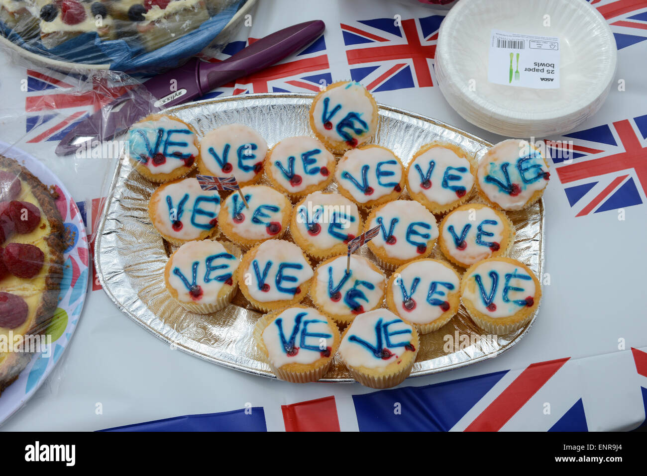 Victory In Europe Day 70th Anniversary Street Party. VE Day cakes on a ...