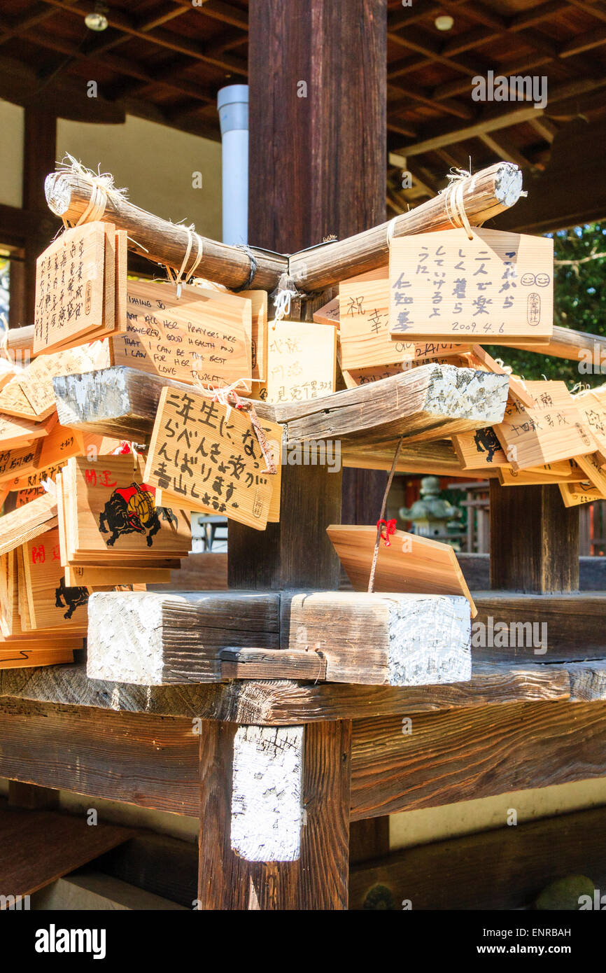 Japan, Nara, Himuro-jinja Buden shrine. Sunlit Ema boards, (wishing ...