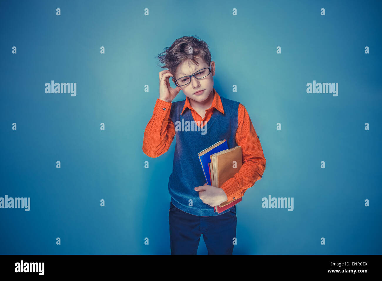 A boy intently reading a book hi-res stock photography and images - Alamy