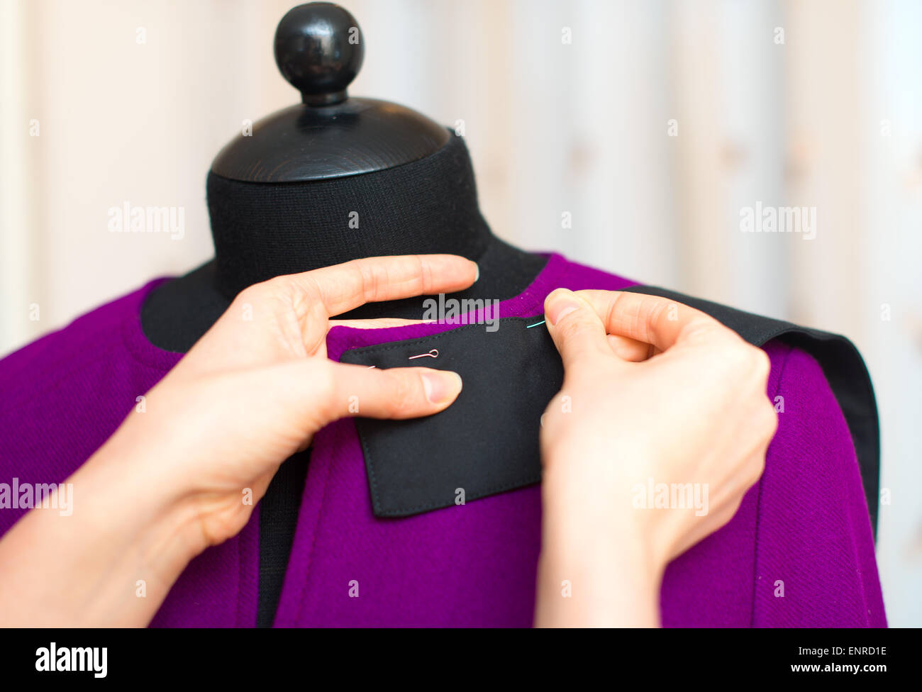 Female fashion designer working on mannequin Stock Photo - Alamy