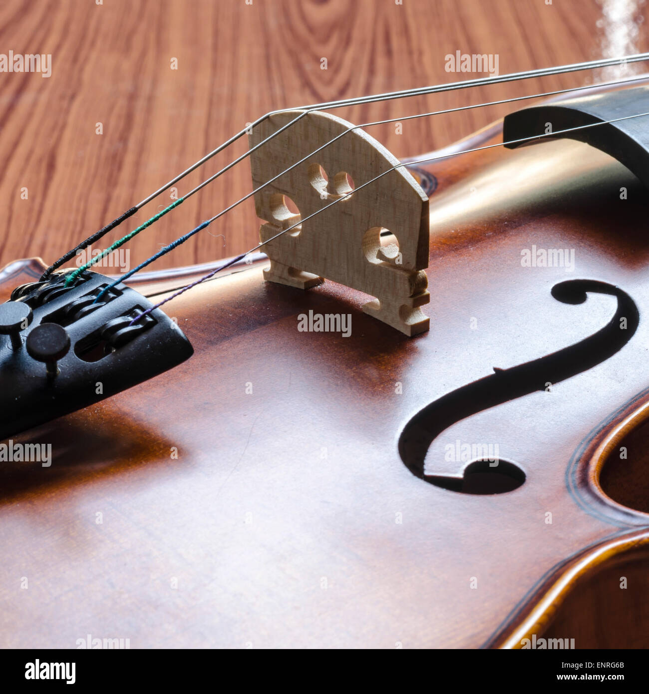 string instrument "violin" on wood background Stock Photo - Alamy