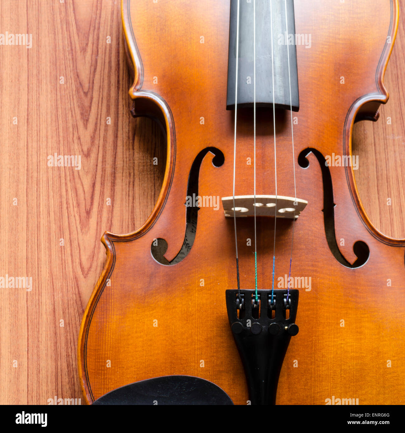 string instrument "violin" on wood background Stock Photo - Alamy