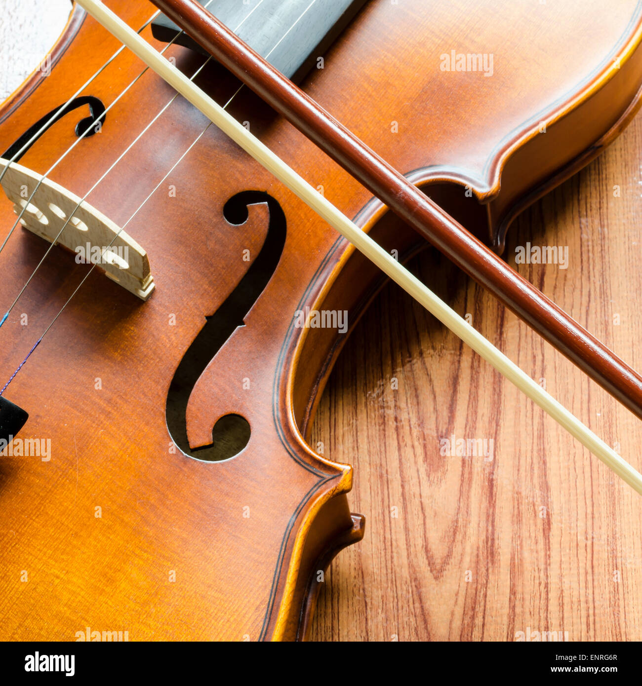 string instrument "violin" on wood background Stock Photo - Alamy