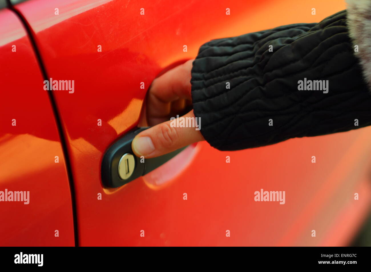 finger pressed the door handle of the car Stock Photo - Alamy