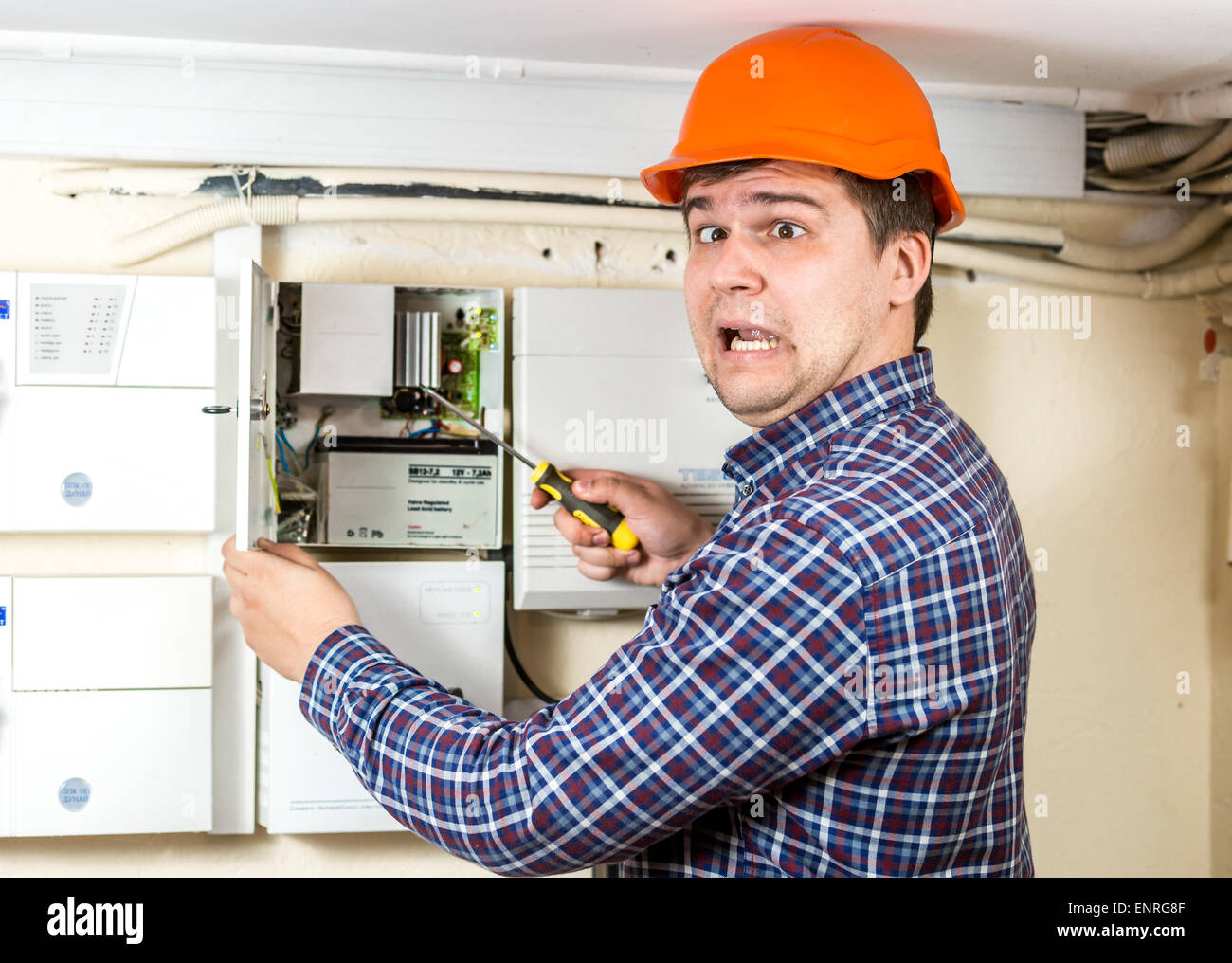 Portrait of young electrician got high voltage shock while repairing ...