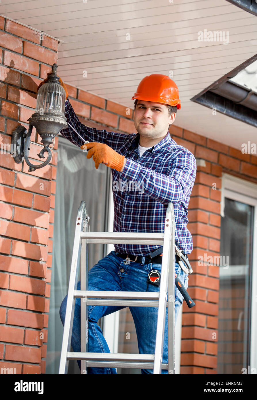 Installing light bulb outdoor hi-res stock photography and images - Alamy