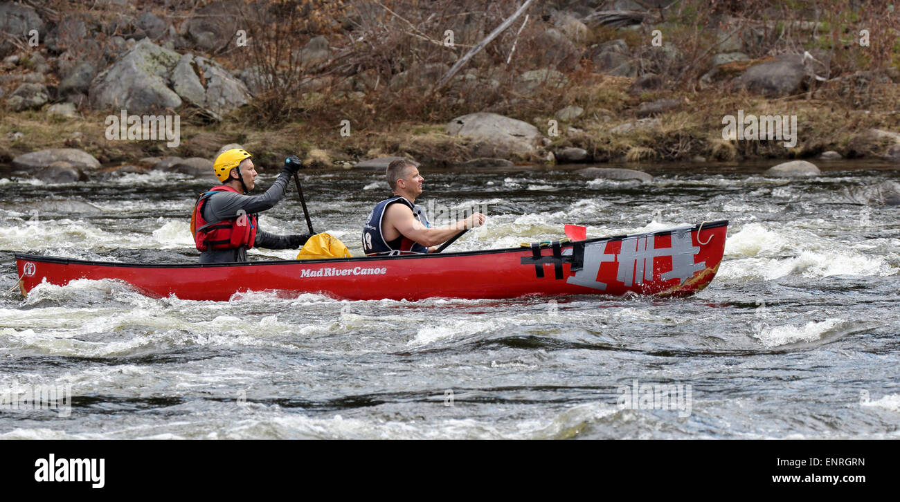 Two men in a mad river canoe fighting the rapids on the Hudson River ...