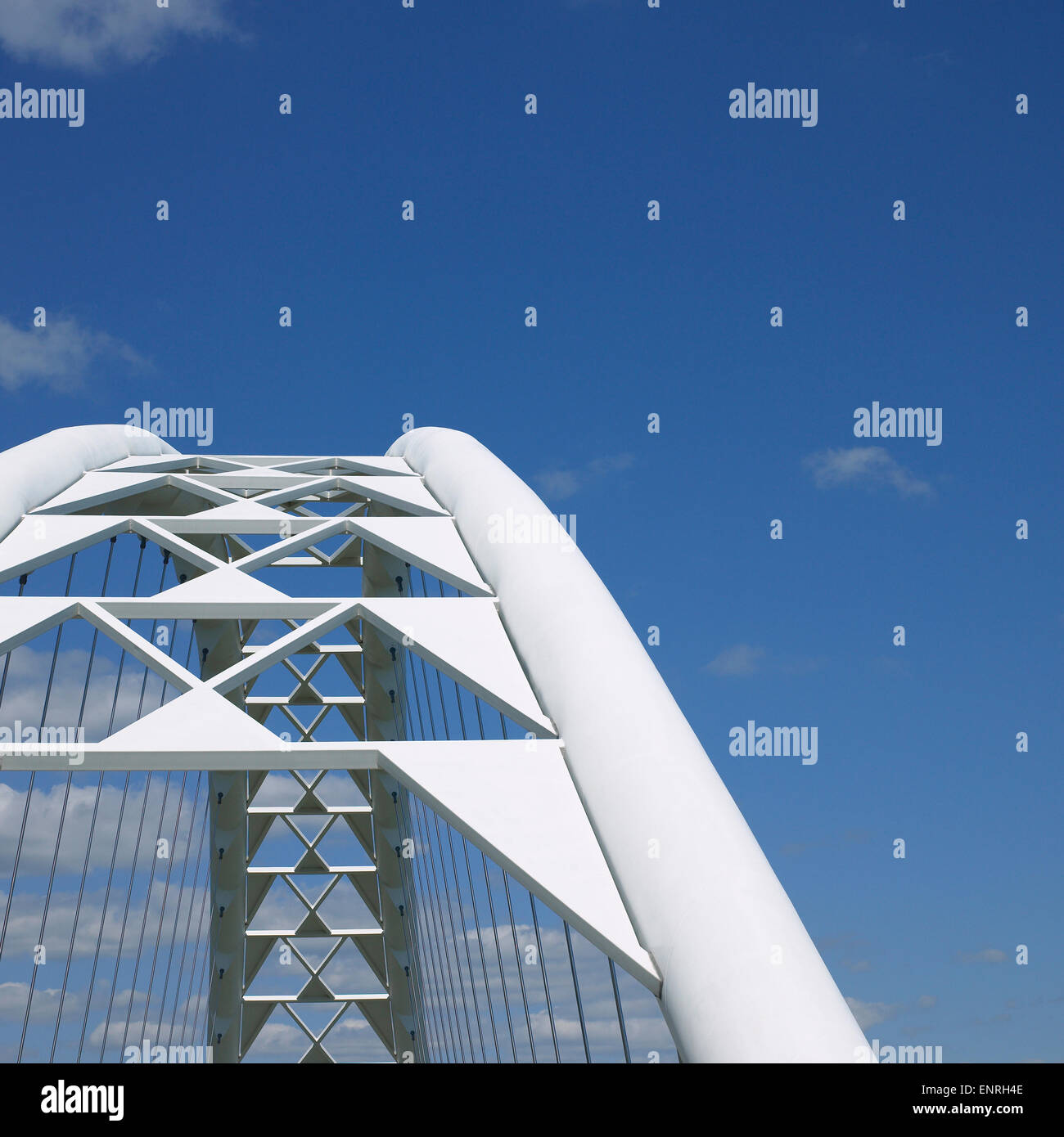 White steel curved modern bridge Stock Photo - Alamy