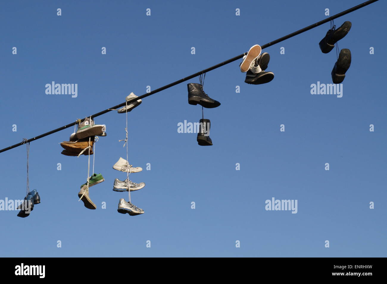 Shoes on a wire hi-res stock photography and images - Alamy