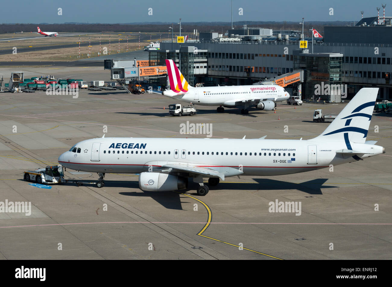Aegean Airlines A320 being pushed back by tug at Dusseldorf ...