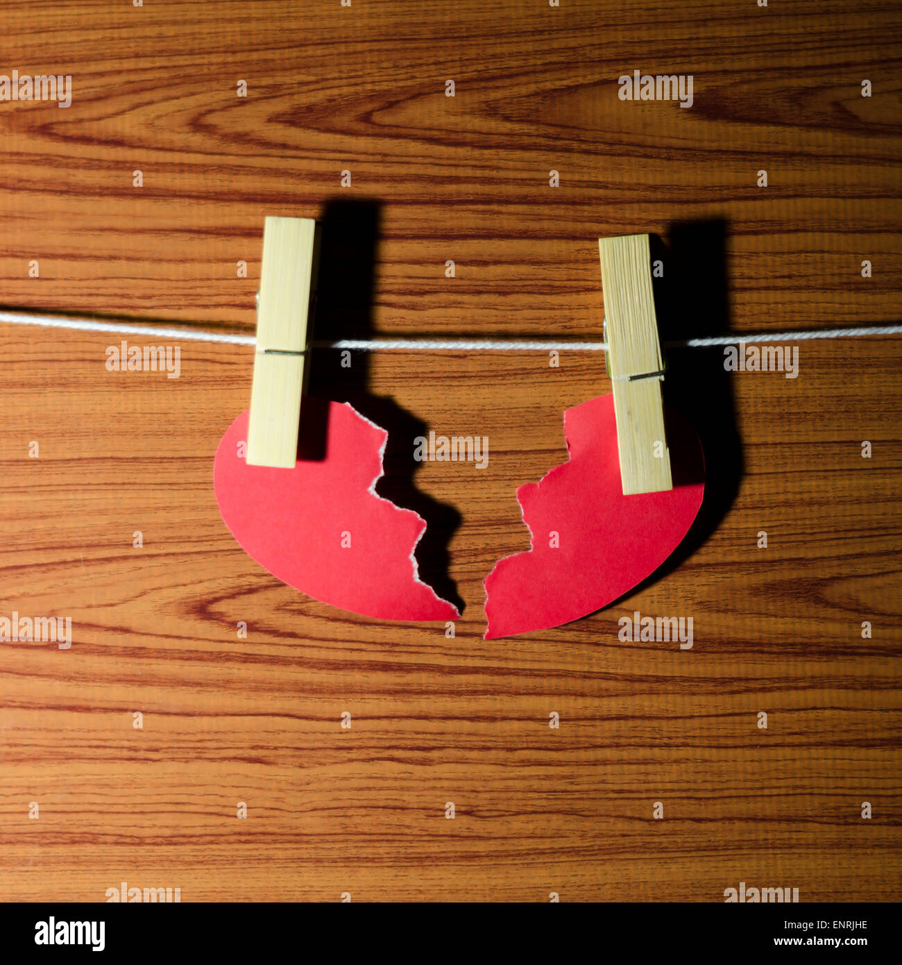 broken red heart word on wood vintage stlye background Stock Photo - Alamy