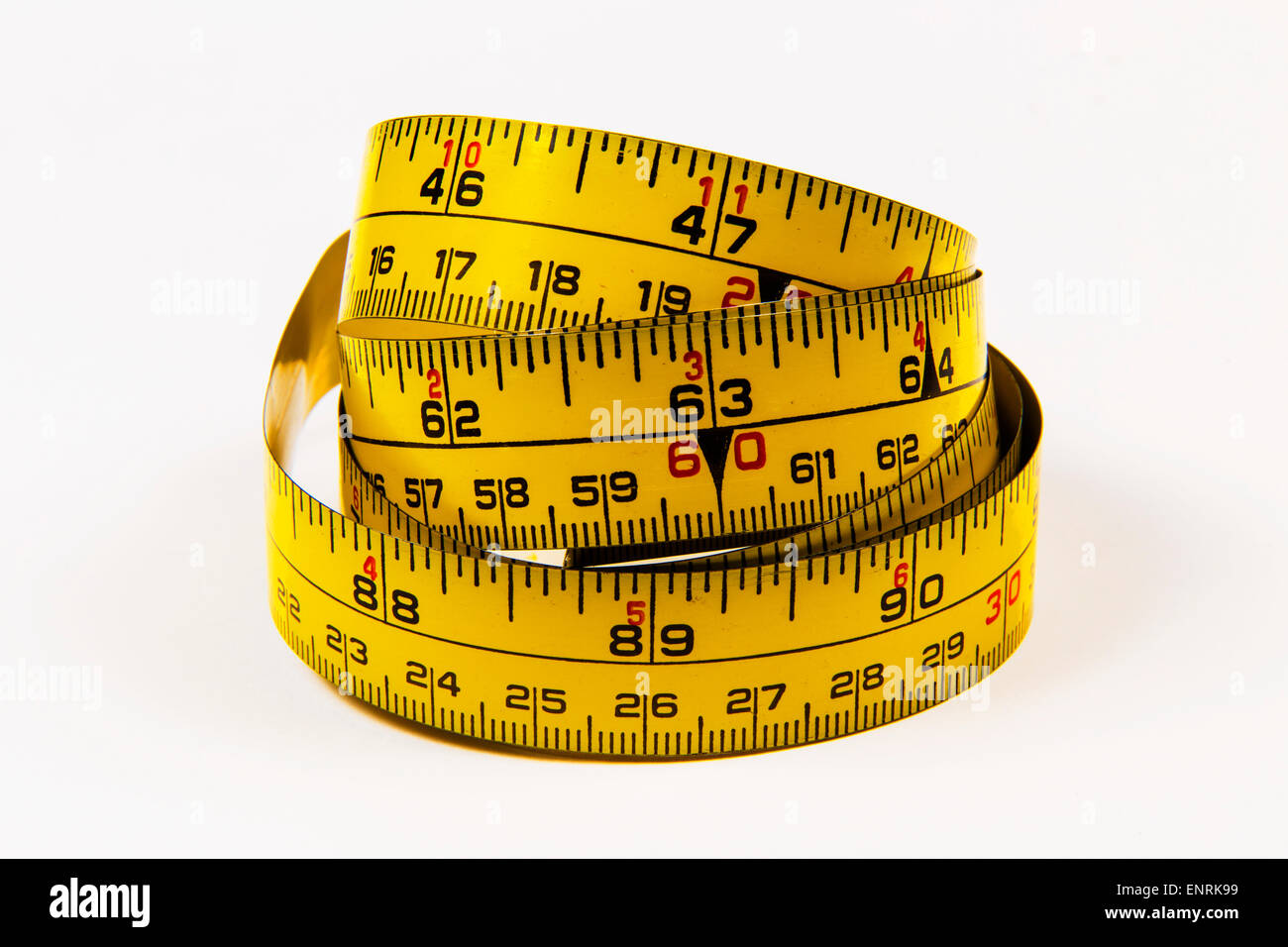 Tape Measure rolled up on white back ground Stock Photo - Alamy