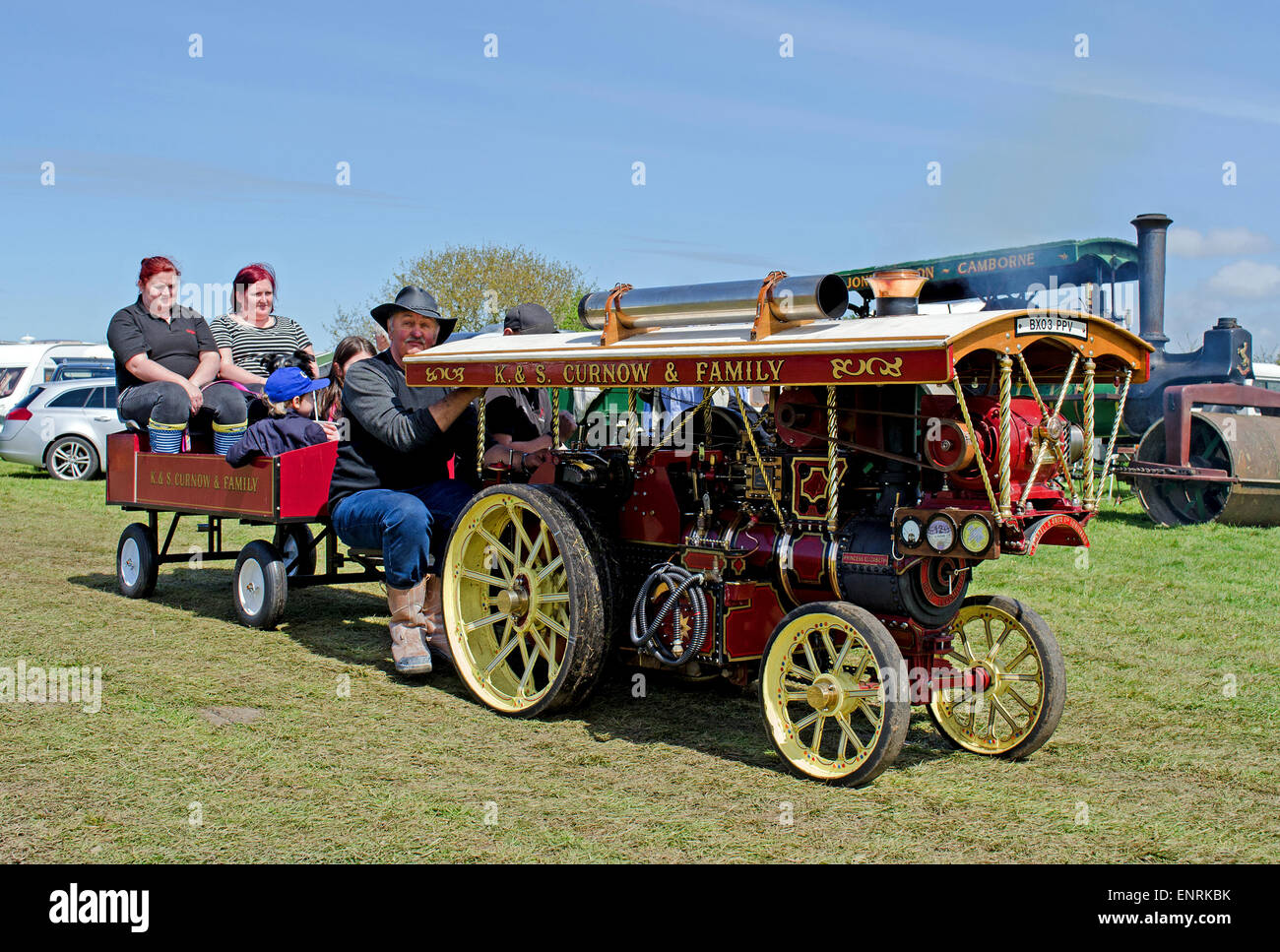 a miniature steam engine giving pleasure rides at a vintage rally in ...