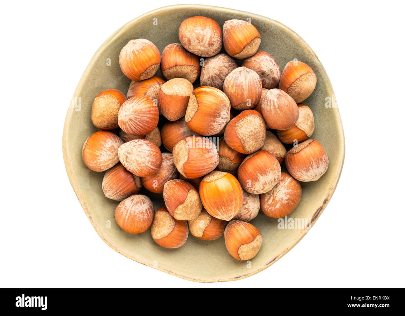 hazelnuts in a ceramic bowl isolated on white Stock Photo - Alamy