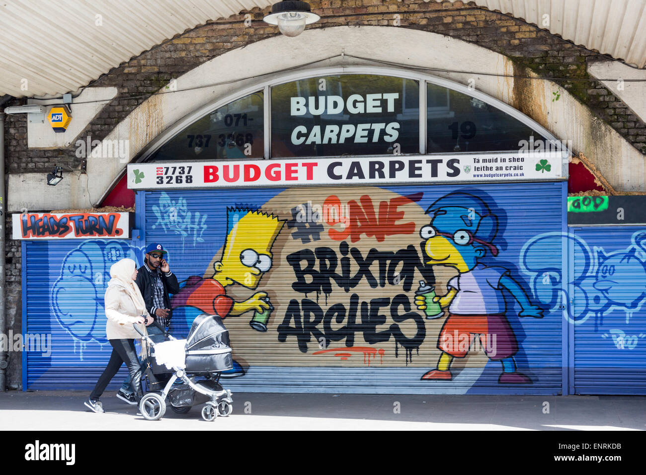 Colourful protest graffiti displaying characters from The Simpsons at ...