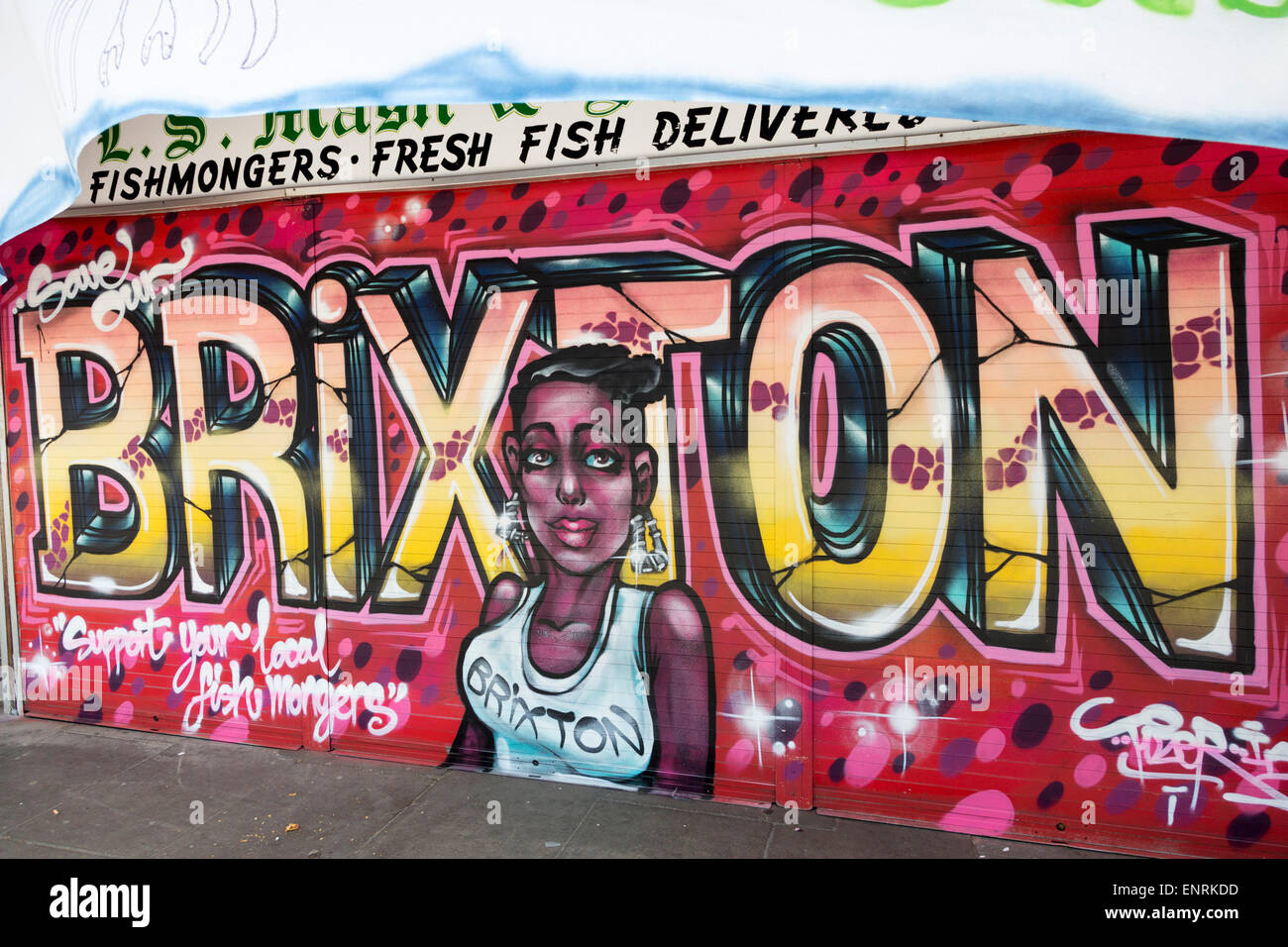 Colourful protest graffiti at Brixton's Railway Arches facing ...