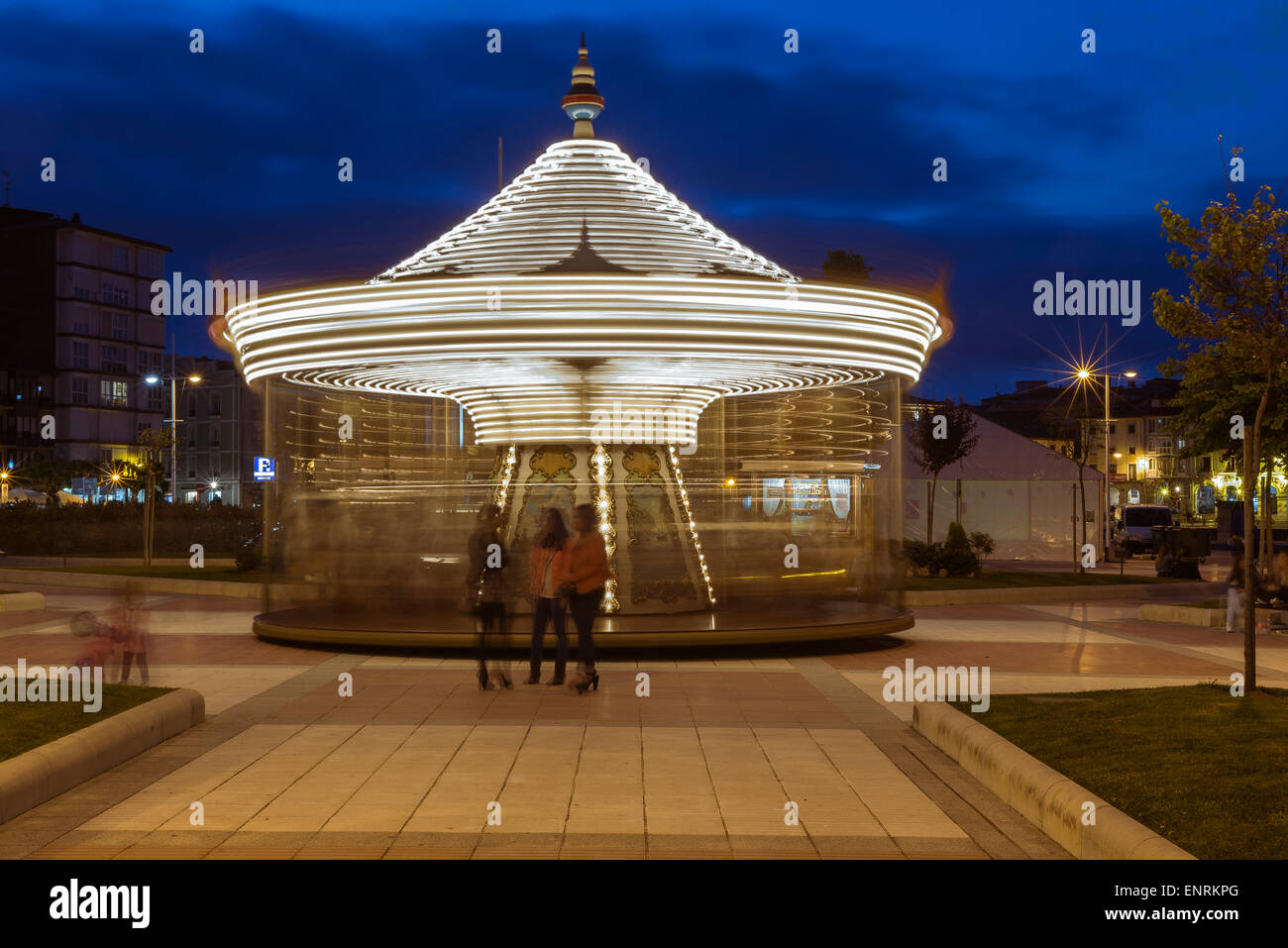 Carousel in motion at night in Castro Urdiales. Cantabria, Spain Stock ...