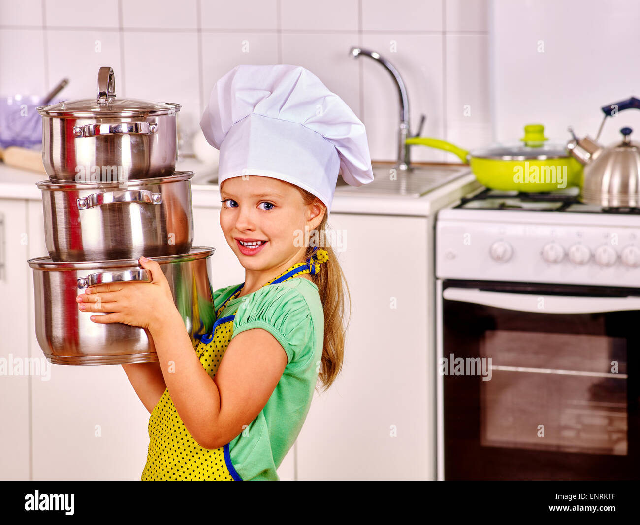 Child cooking at kitchen Stock Photo - Alamy