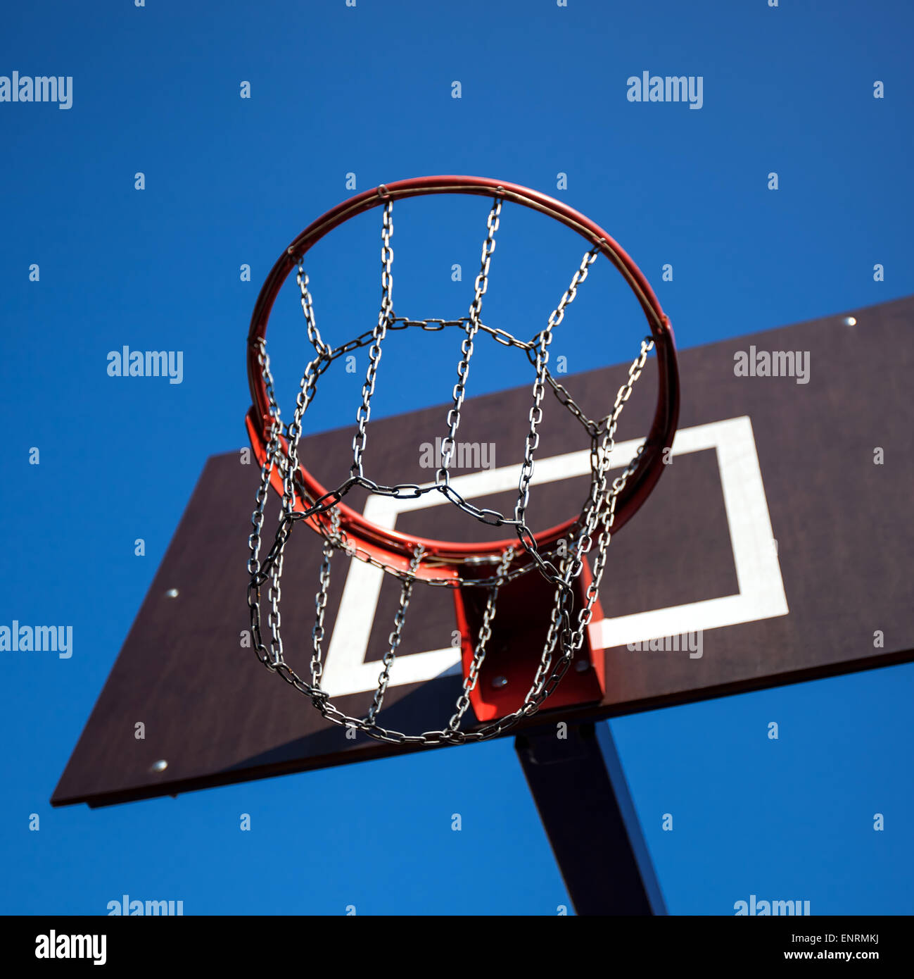 Basketball hoop on a blue sky background Stock Photo - Alamy