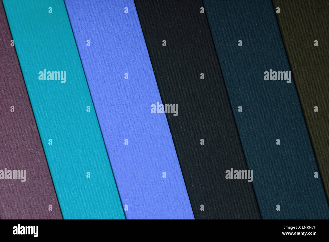 Vertical image of a multiple colored paper stripes Stock Photo - Alamy