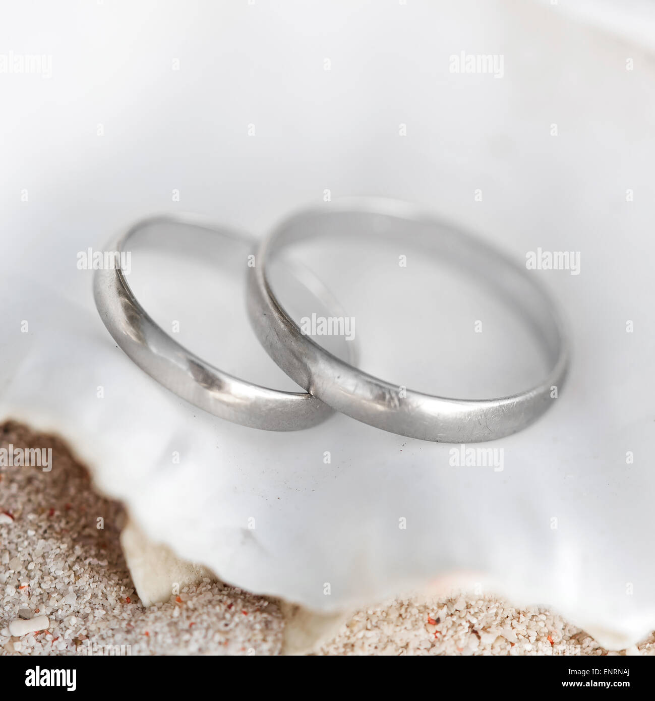 Celebration Valentine's day on beach, rings on shell Stock Photo - Alamy