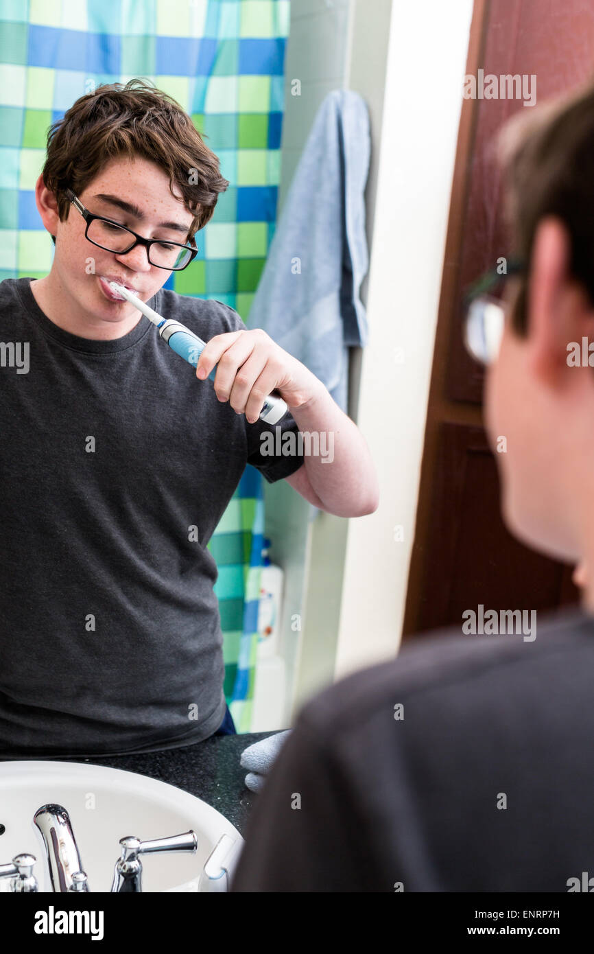 Teenage boy getting ready for school in the morning Stock Photo - Alamy