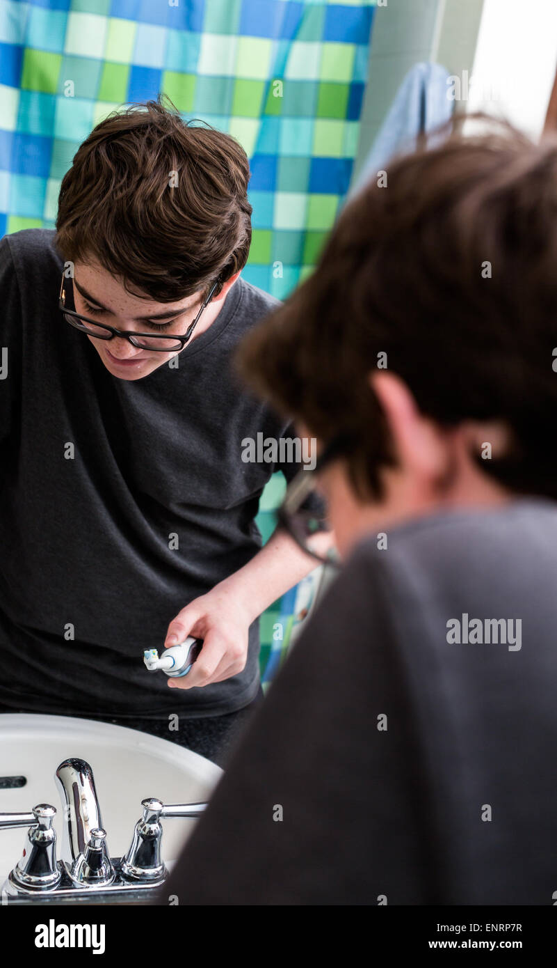 Teenage boy getting ready for school in the morning Stock Photo - Alamy