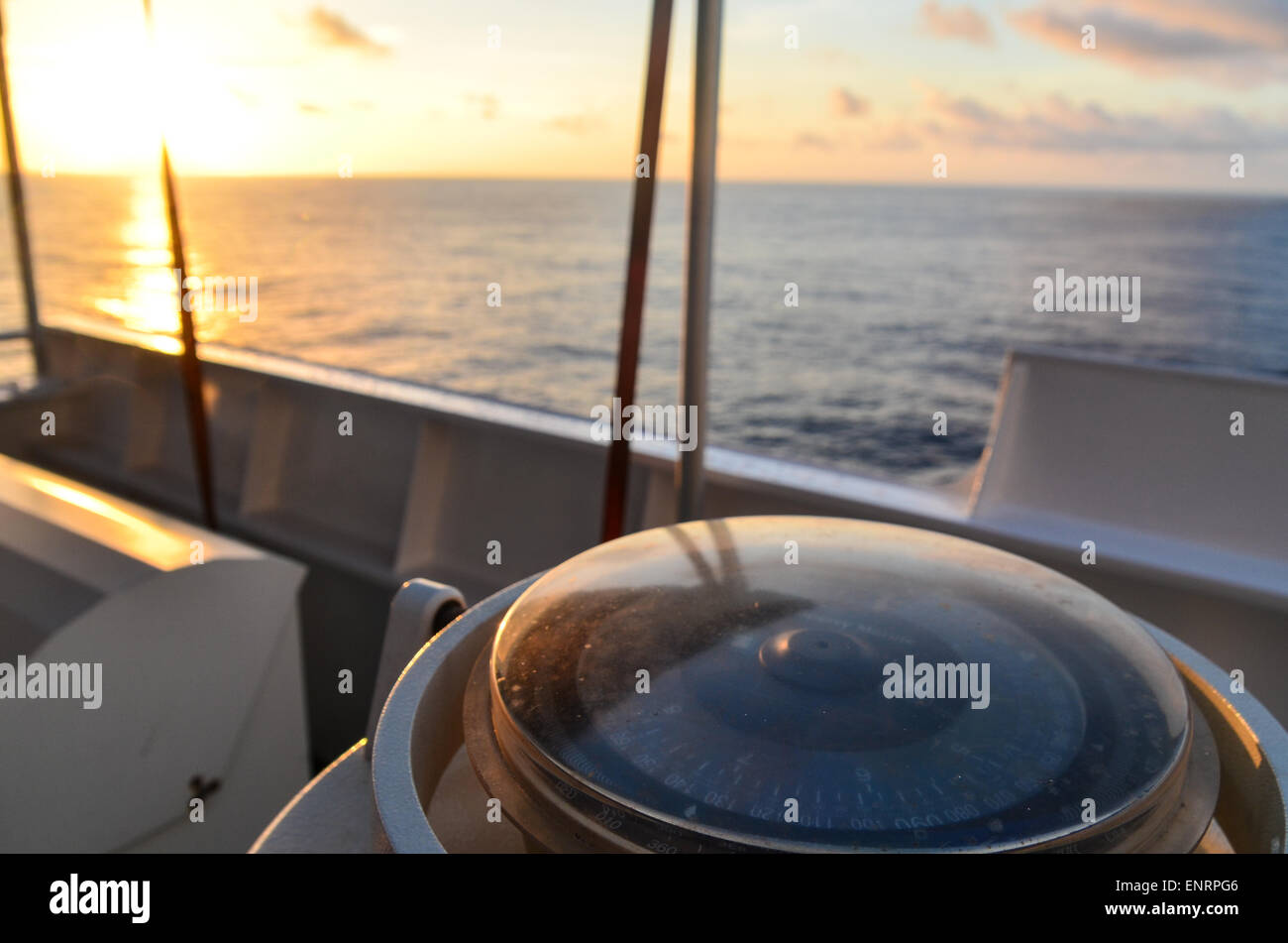 Rotating copmass on the ship bridge of a cargo vessel while sailing in ...