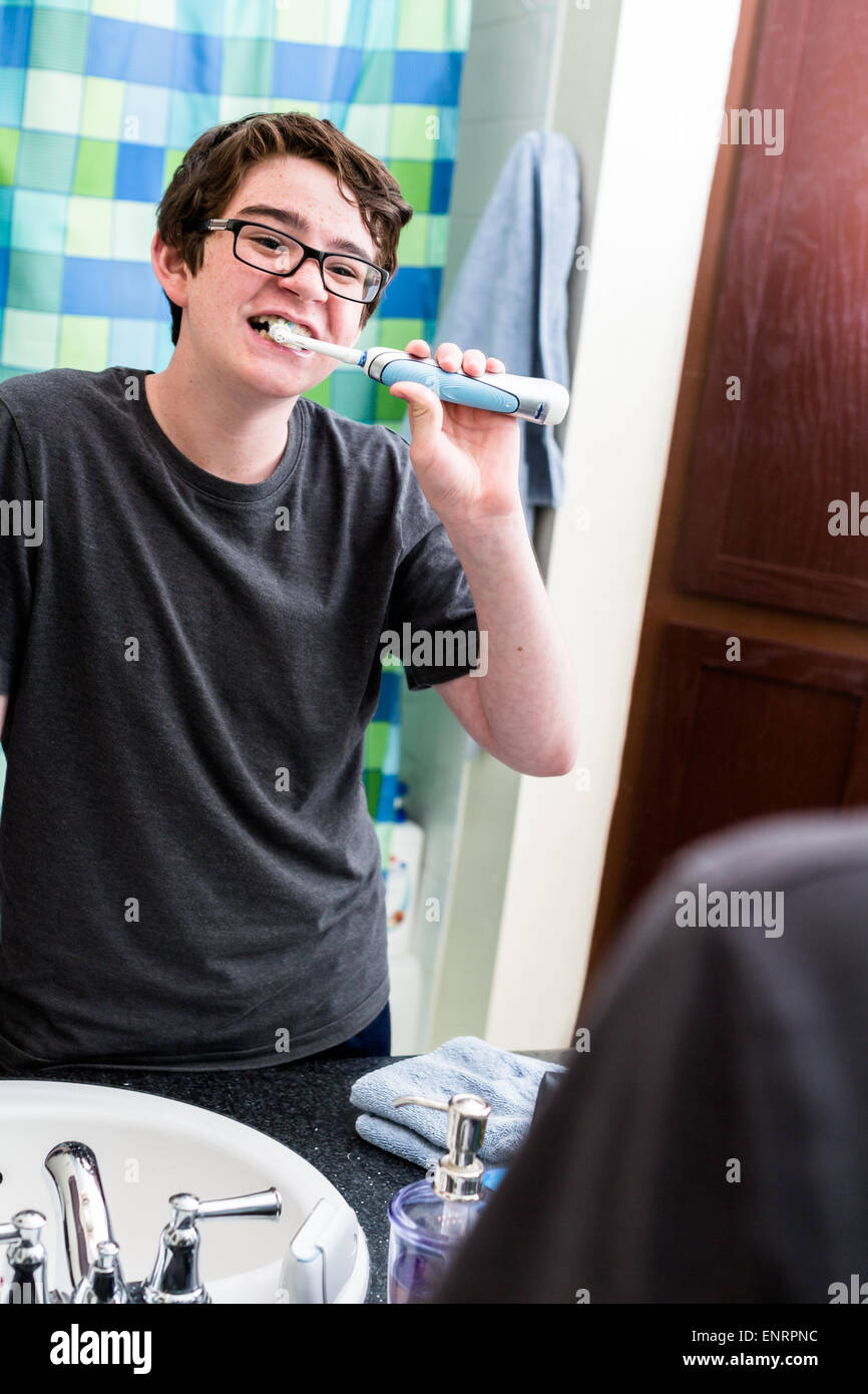 Teenage boy getting ready for school in the morning Stock Photo - Alamy