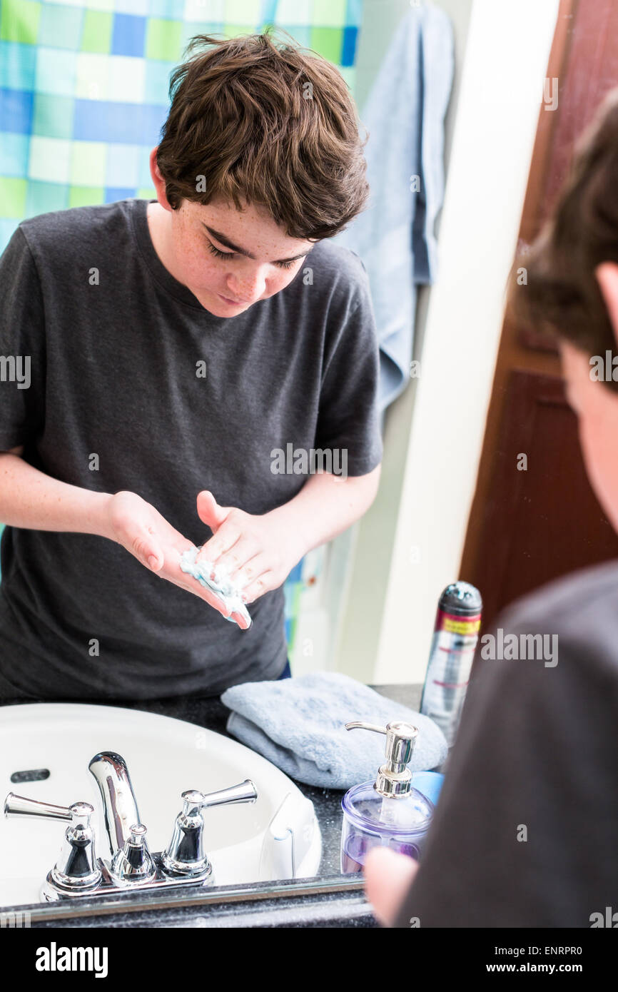 Teenage boy getting ready for school in the morning Stock Photo - Alamy