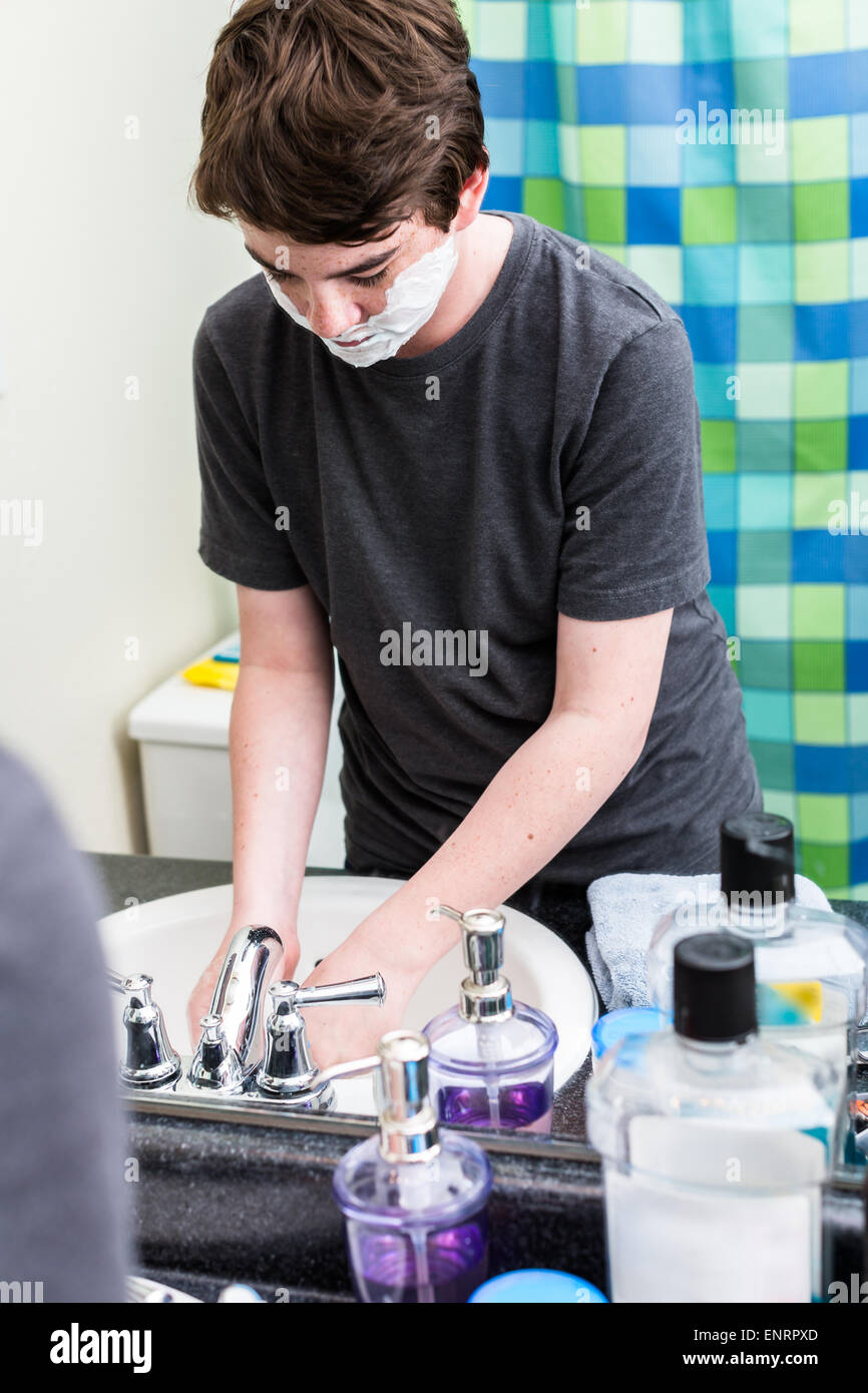 Teenage boy getting ready for school in the morning Stock Photo - Alamy