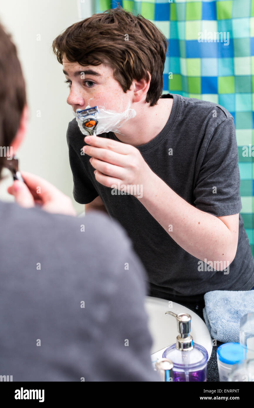 Teenage boy getting ready for school in the morning Stock Photo - Alamy