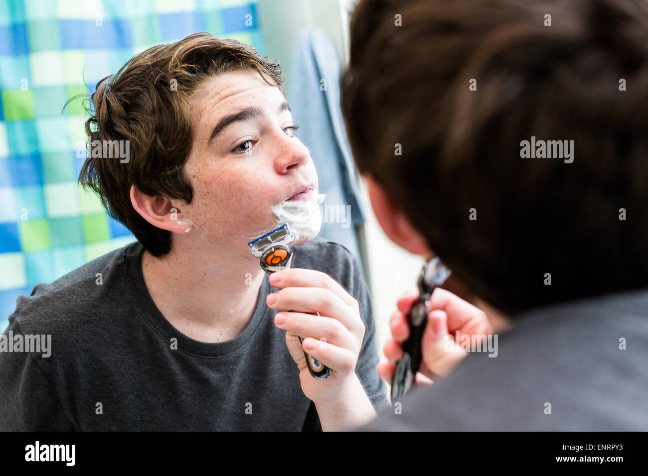 Teenage boy getting ready for school in the morning Stock Photo - Alamy