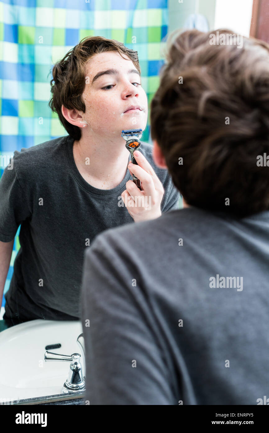 Teenage boy getting ready for school in the morning Stock Photo - Alamy