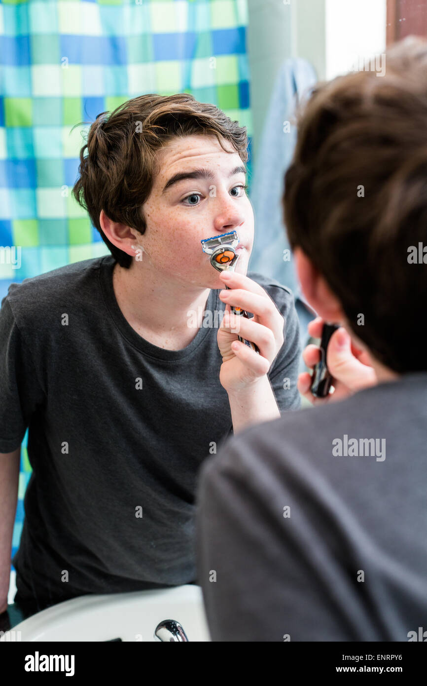 Teenage boy getting ready for school in the morning Stock Photo - Alamy