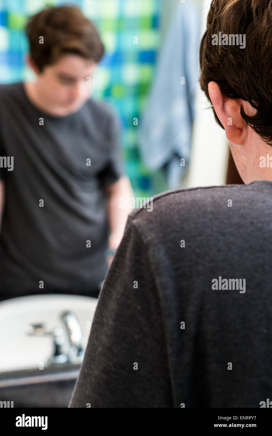 Teenage boy getting ready for school in the morning Stock Photo - Alamy