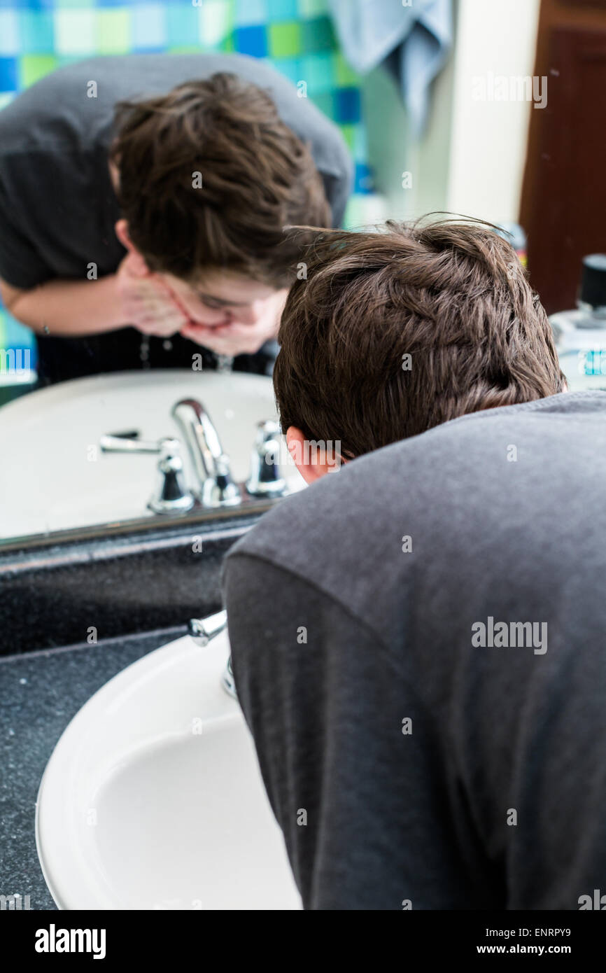 Teenage boy getting ready for school in the morning Stock Photo - Alamy