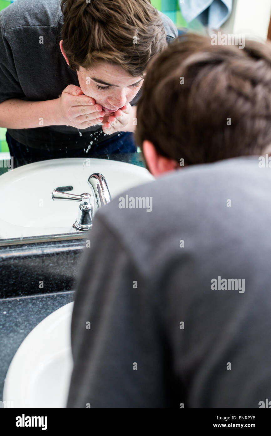 Teenage boy getting ready for school in the morning Stock Photo - Alamy