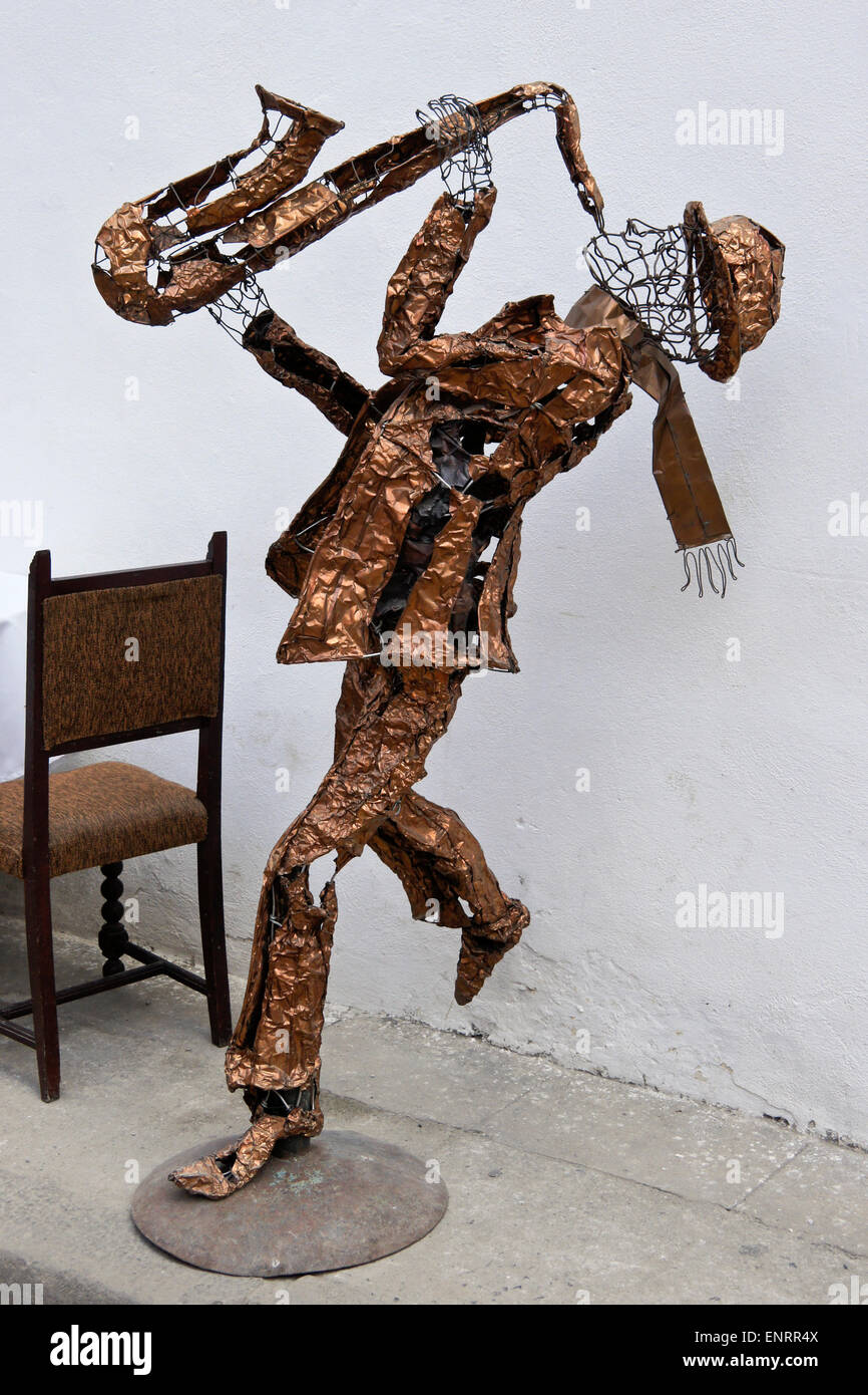 Copper sculpture of man playing saxophone, near Plaza de la Catedral ...