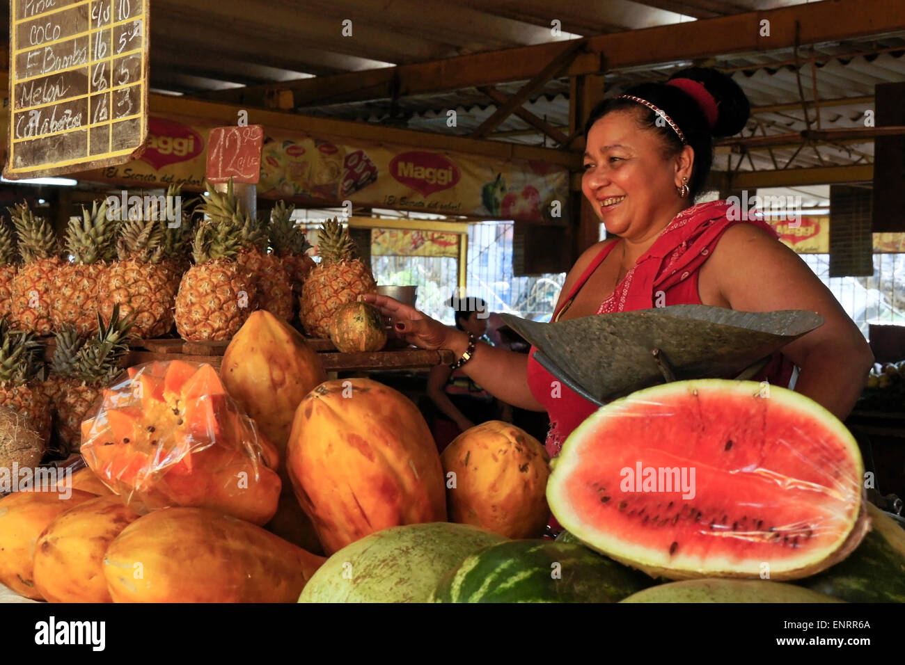 Woman selling fruit in farmers' market, Vedado district, Havana, Cuba ...