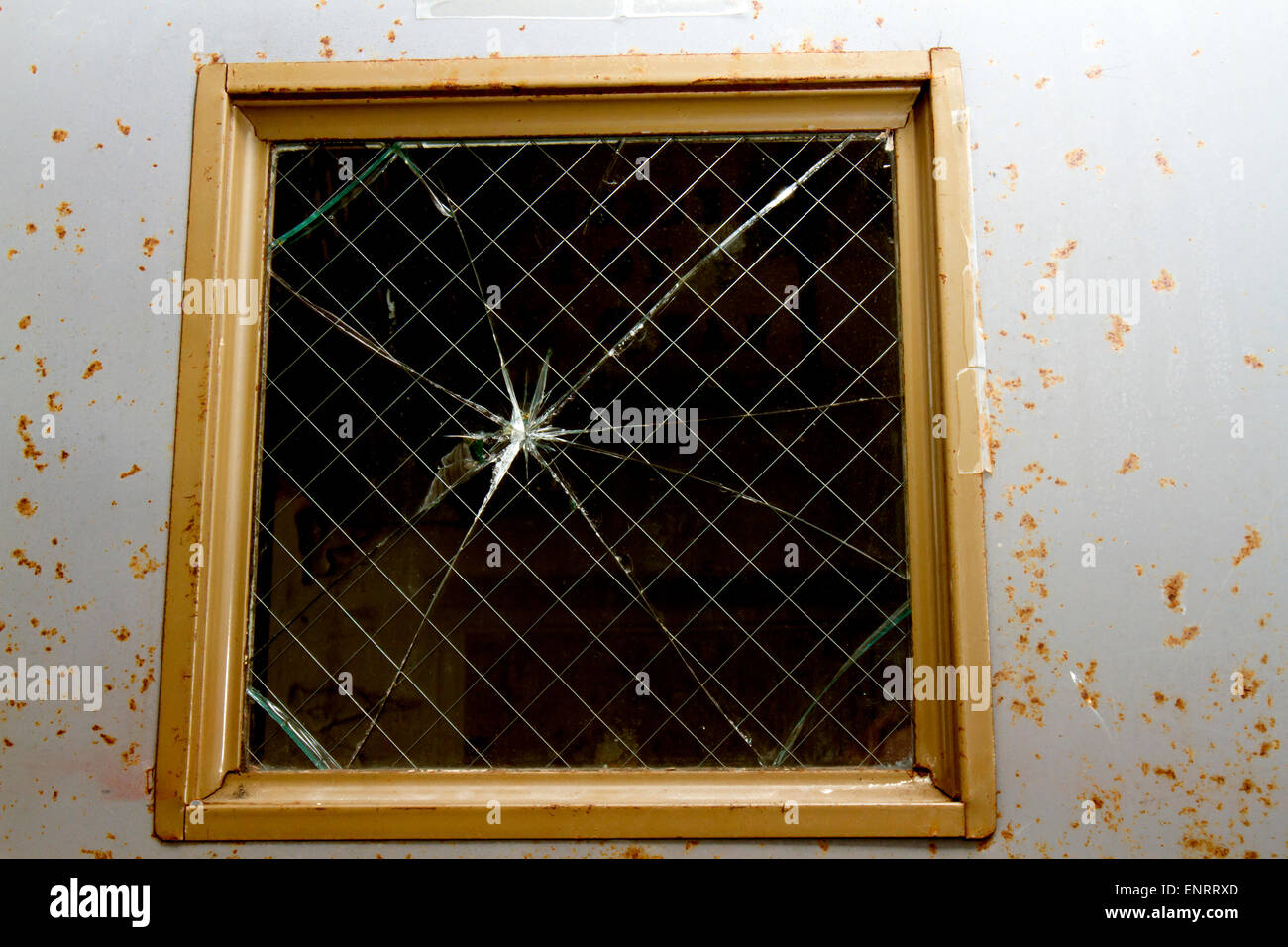 Broken glass on door window Stock Photo - Alamy