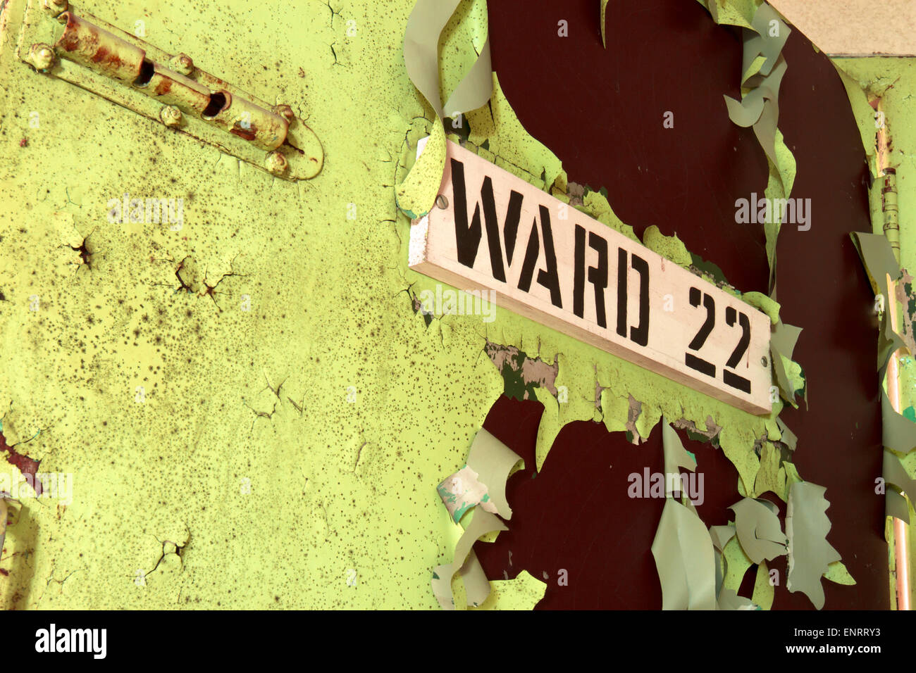 Ward 22 sign on peeling, chipping door in old institution Stock Photo ...