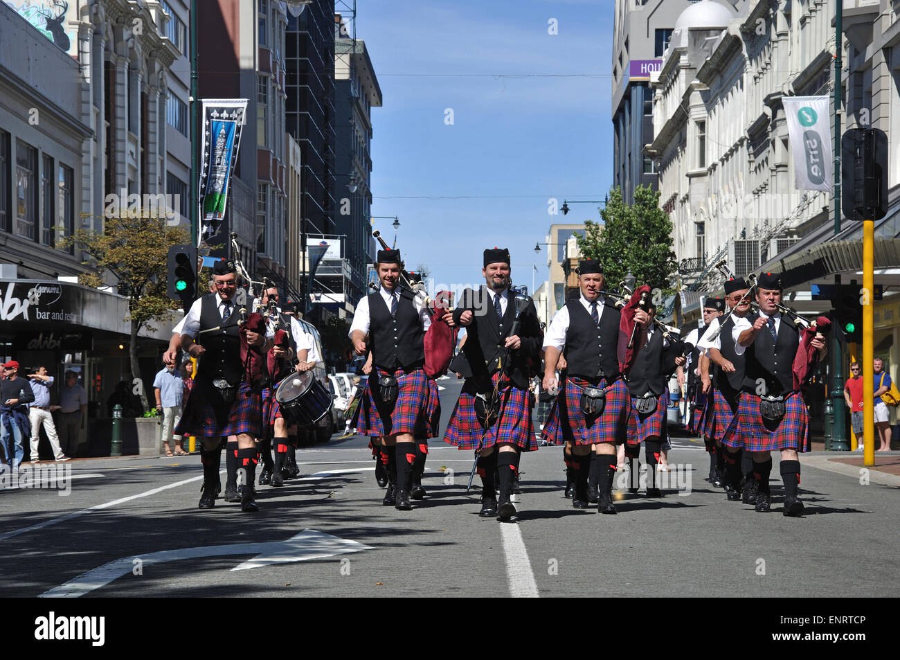 DUNEDIN, NEW ZEALAND, FEBRUARY 21: The Christchurch Pipe Band marches ...