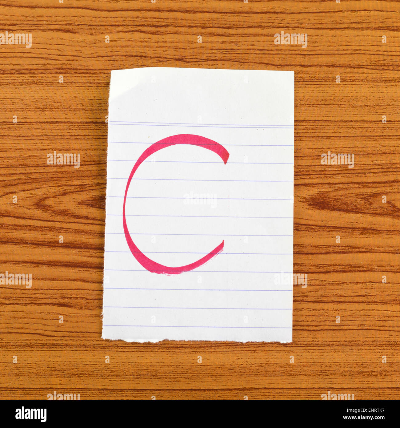 grade c on wood wall background Stock Photo - Alamy