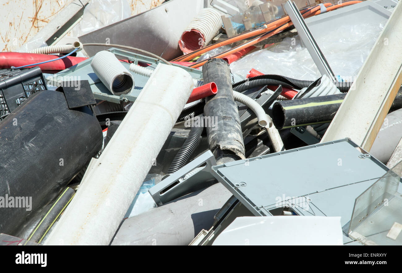 tubes and plastic pieces in special waste landfill controlled Stock ...